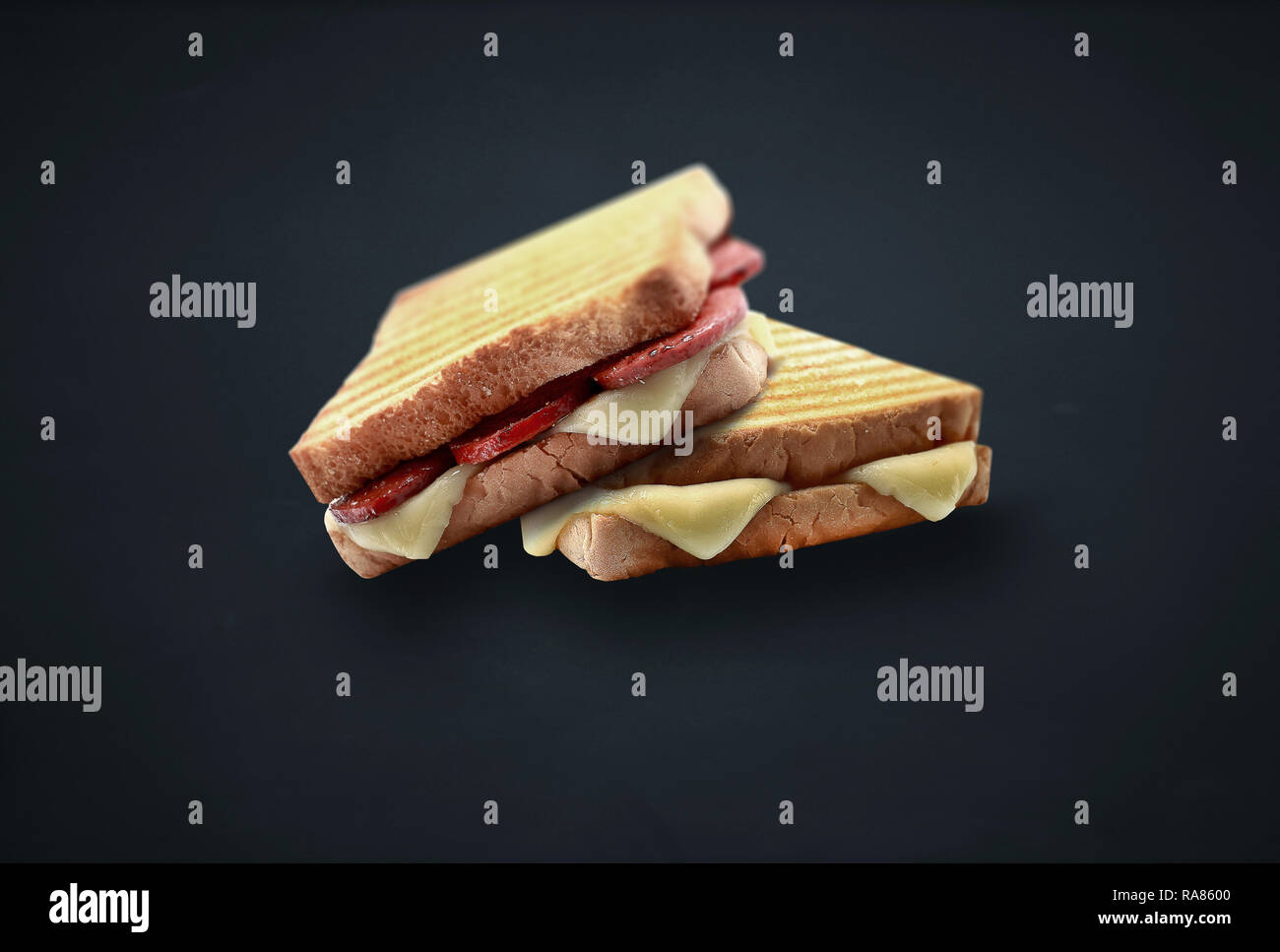 Turkish toast with "sucuk and cheese" on black background Stock Photo ...