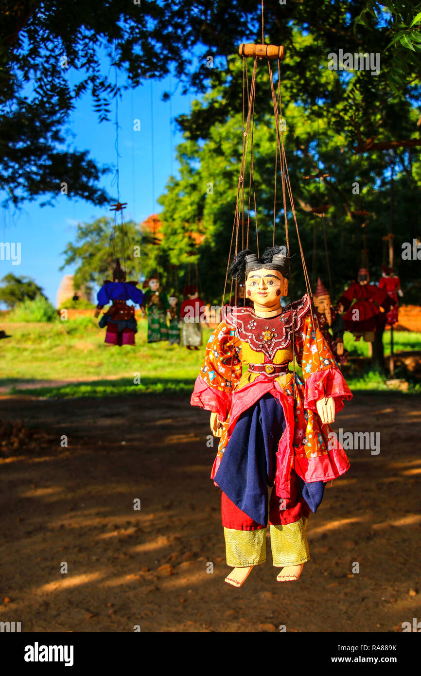 Traditional handicraft puppet is sold in a market in Bagan, Myanmar ...