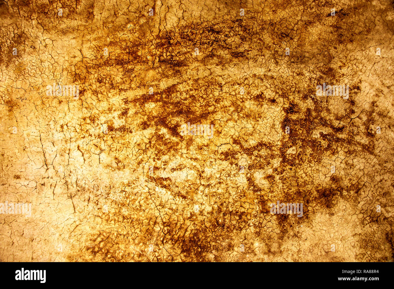 Plaster brown and yellow colours on the wall Stock Photo - Alamy