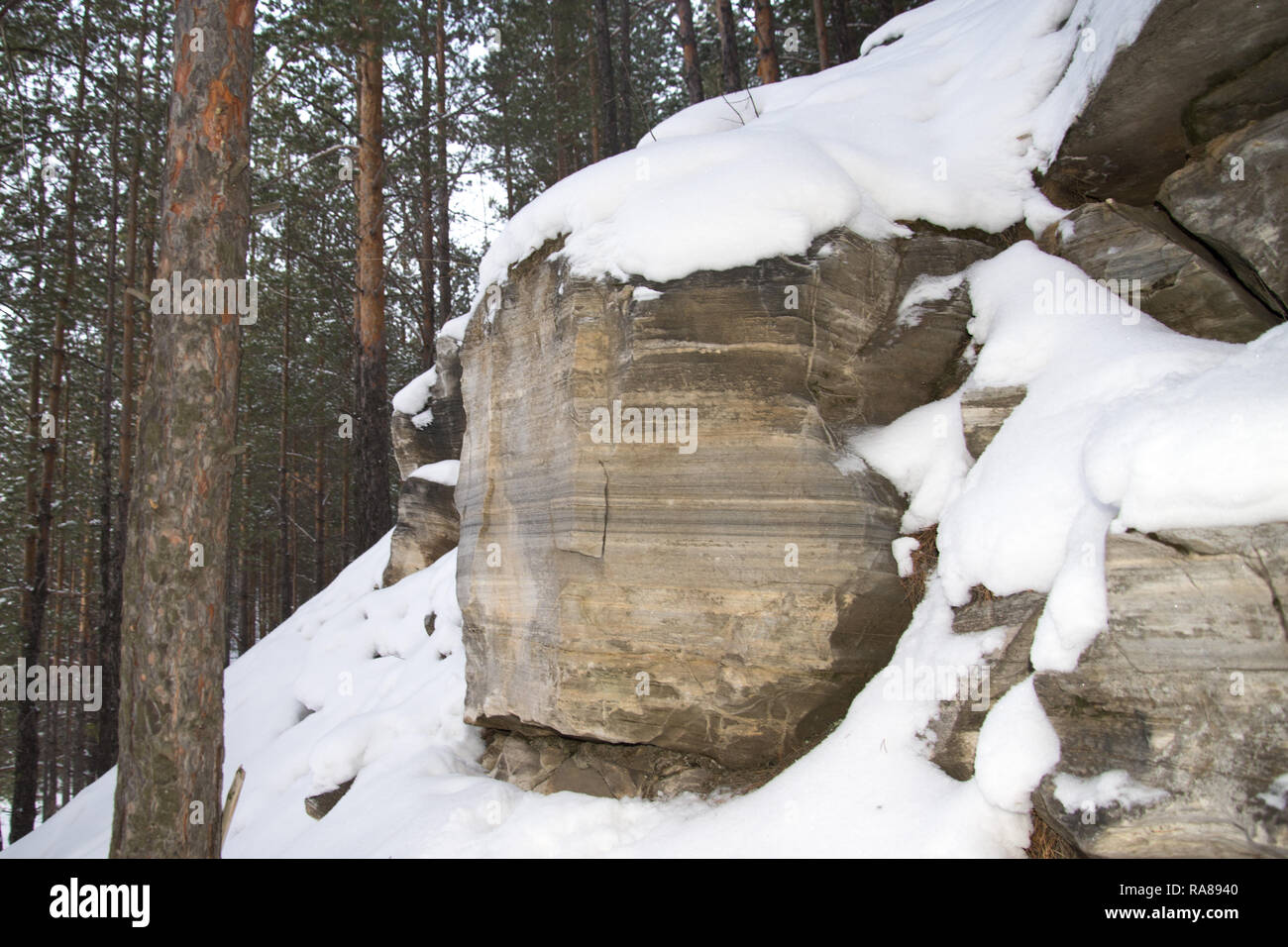 Marble rock in the forest under the snow, Russia, Ural Stock Photo - Alamy