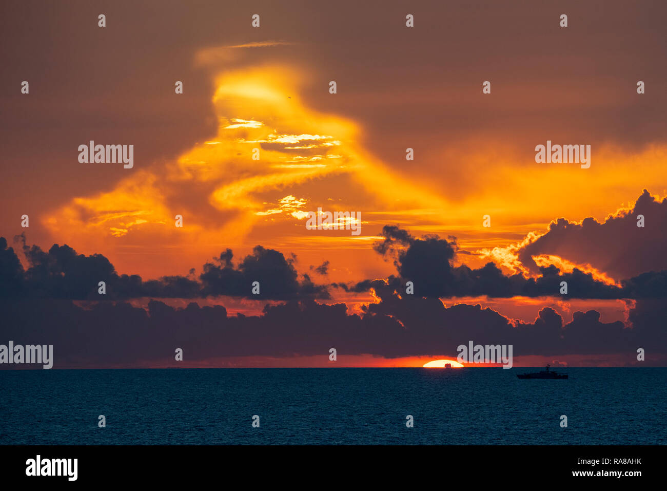 Panama sunset with ship Stock Photo - Alamy