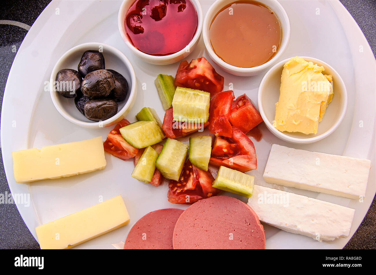 Traditional Turkish Food. Breakfast, black olives, cherries jam, honey ...