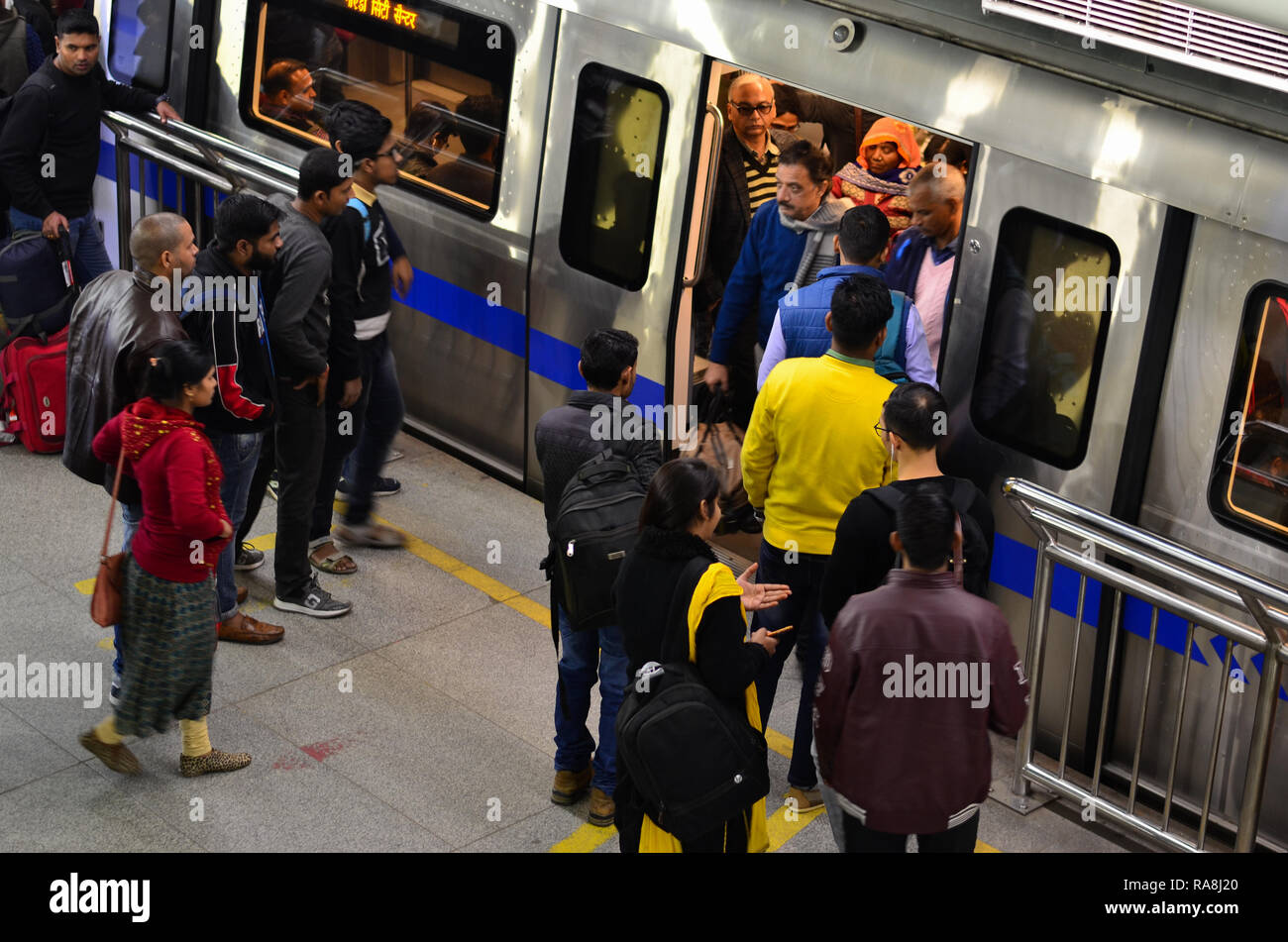 Delhi, India, 2019.High Angle shot of people getting off Delhi metro at ...