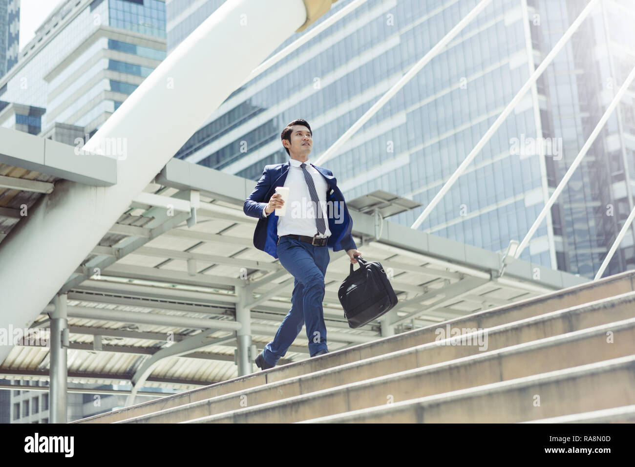 Business man run to work in rush hour Stock Photo - Alamy