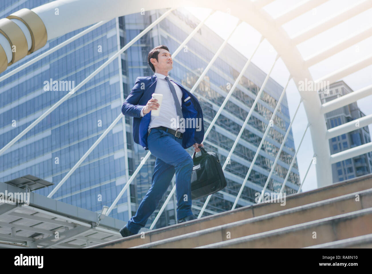 Business man run to work in rush hour Stock Photo - Alamy