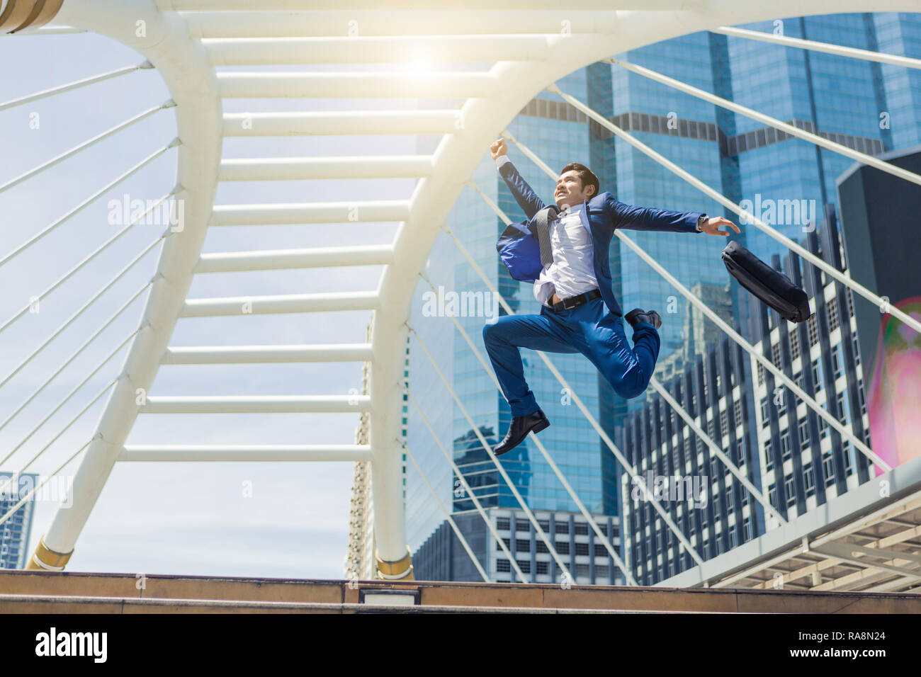 Business man running catch hi-res stock photography and images - Alamy