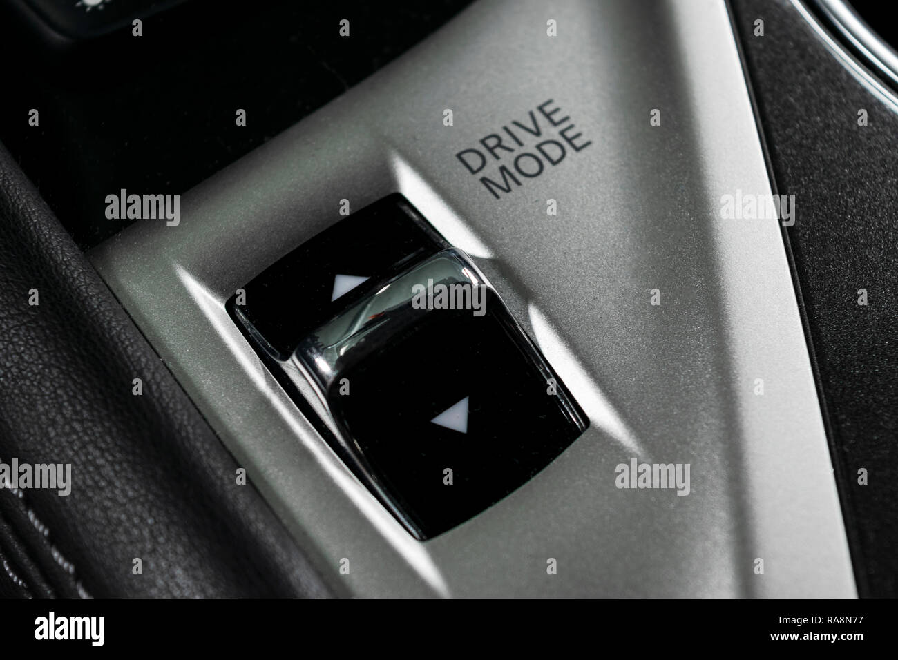 Track control buttons near automatic gear stick of a modern car in ...