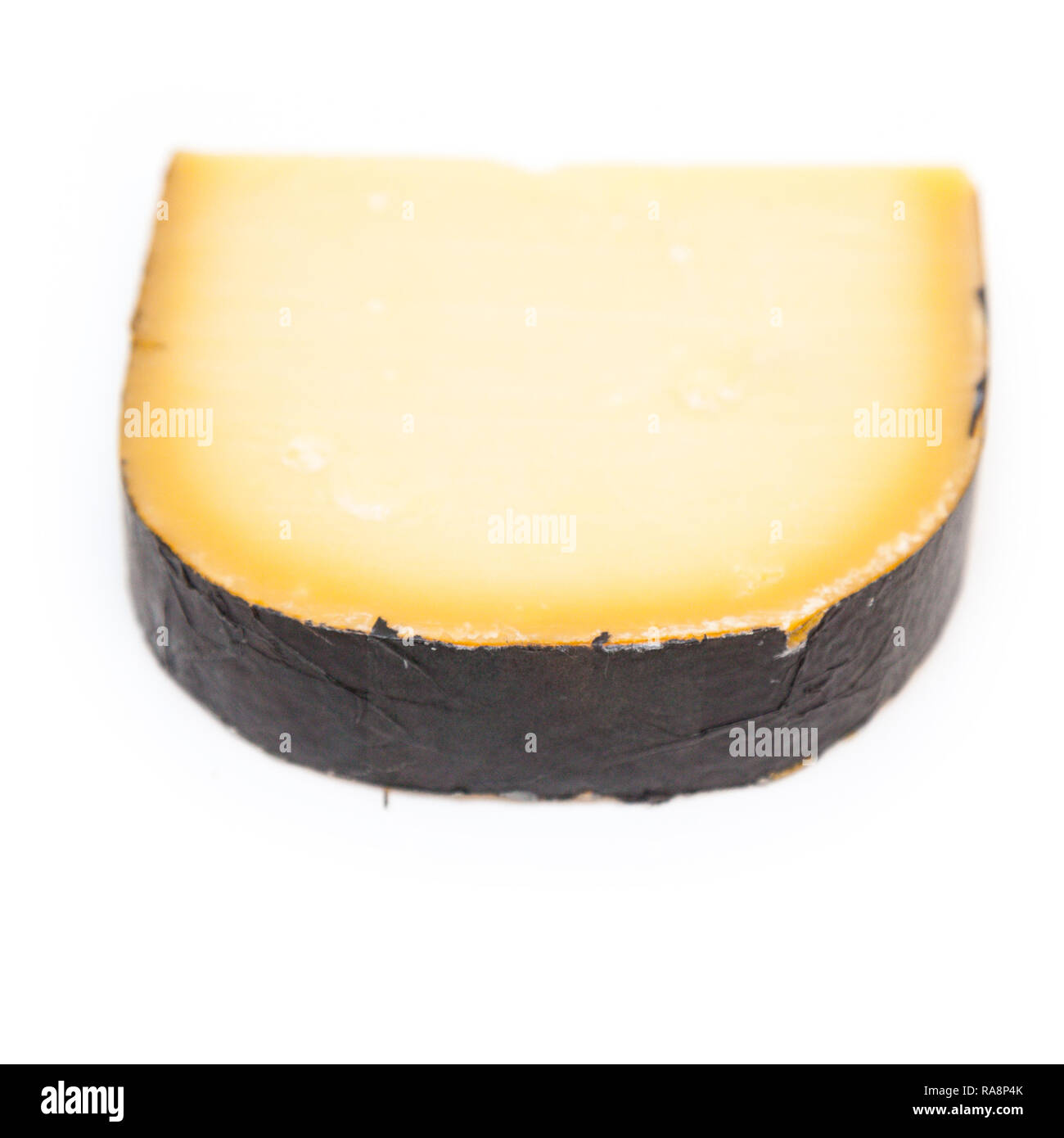 Extra mature Dutch Gouda cheese isolated on a white studio background ...