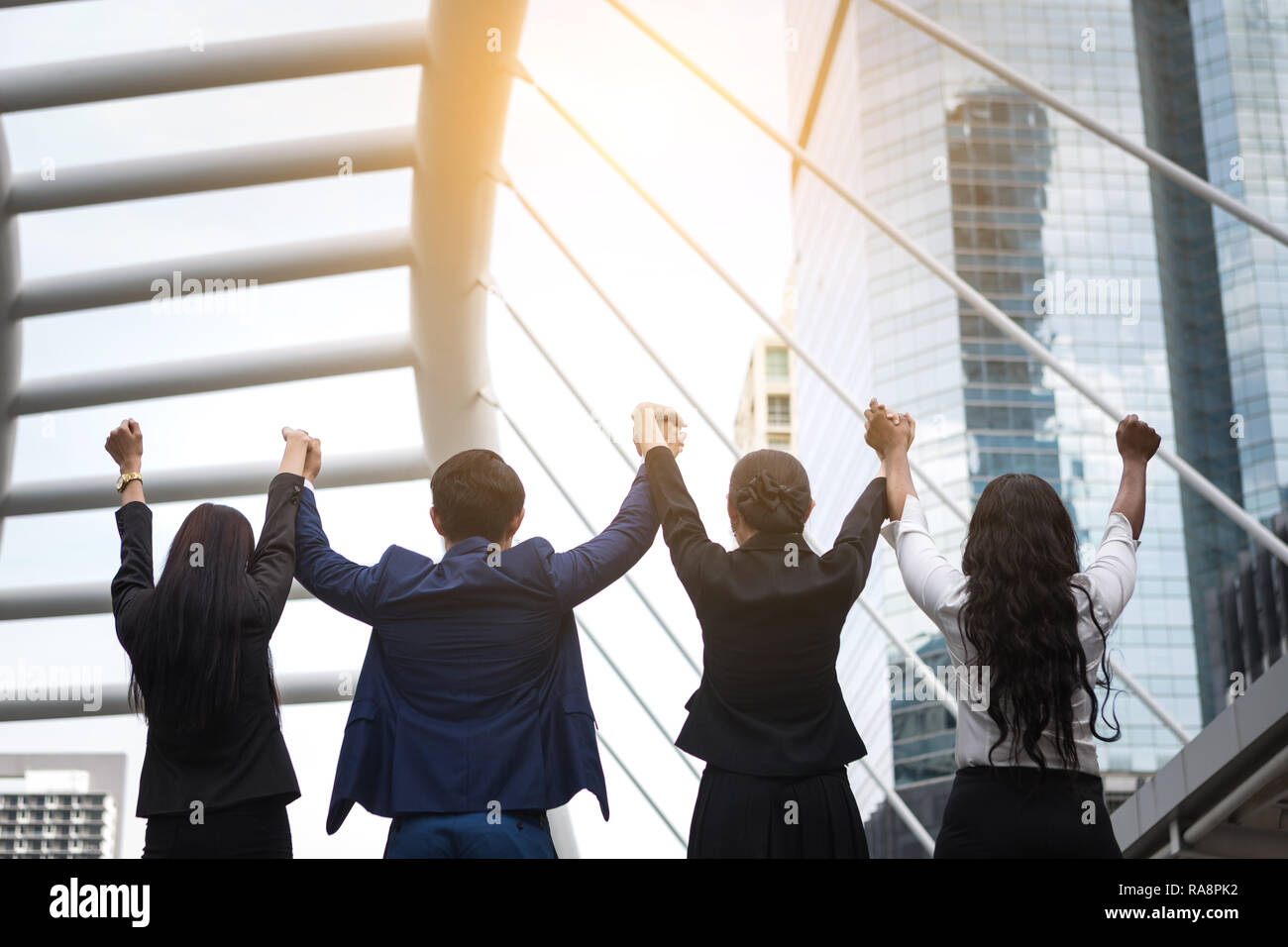 Business officers happy after success of teamwork Stock Photo - Alamy