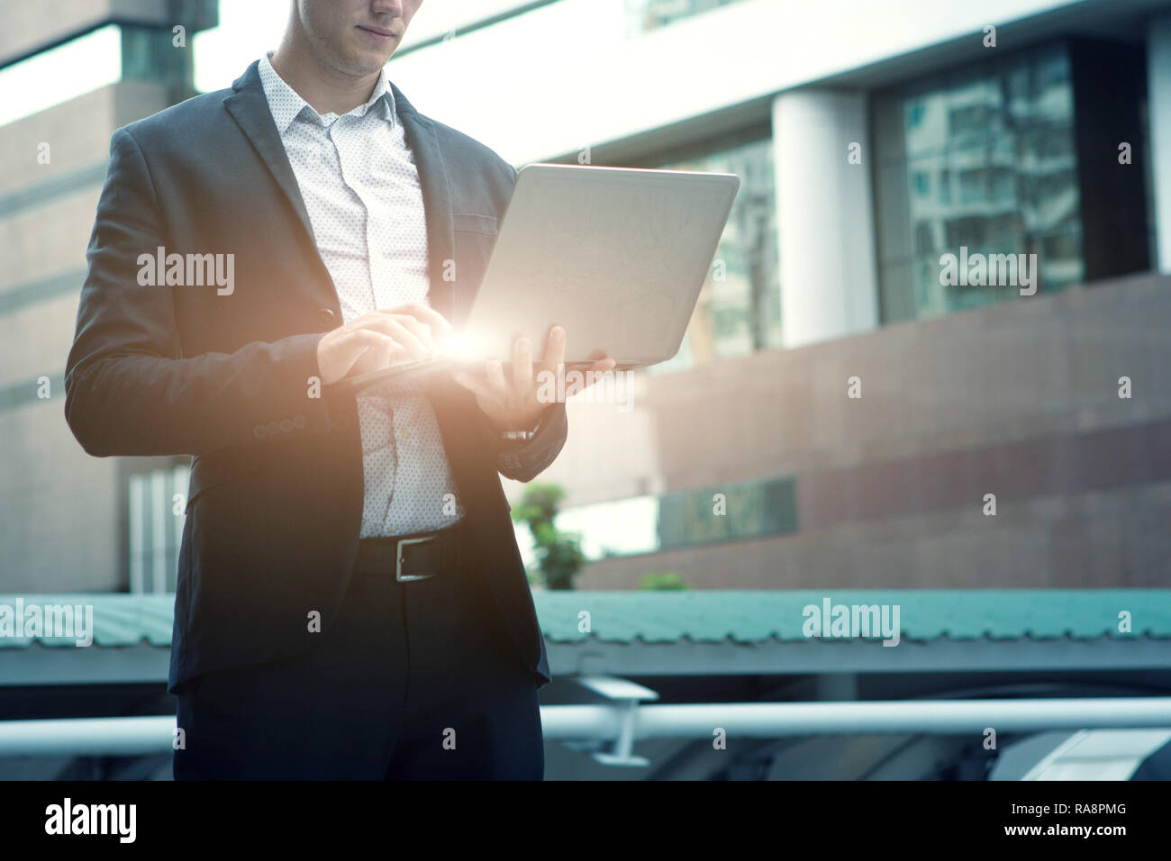 smart business man use laptop outdoor Stock Photo - Alamy