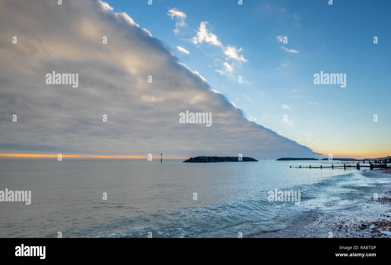 Sea defences and navigation markers at Elmer Sands beach near Middleton ...
