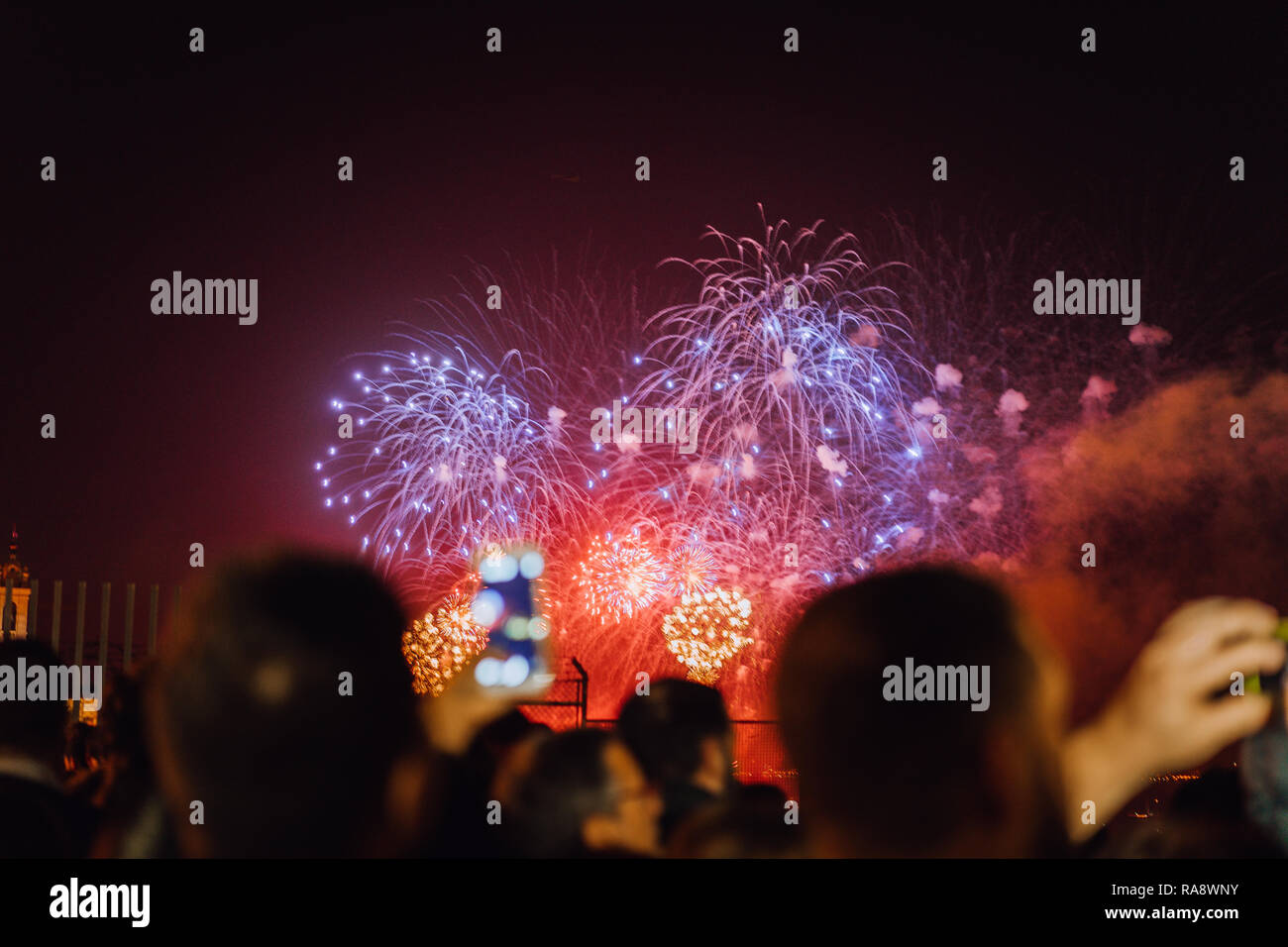 People watching fireworks and celebrating New Year Stock Photo - Alamy