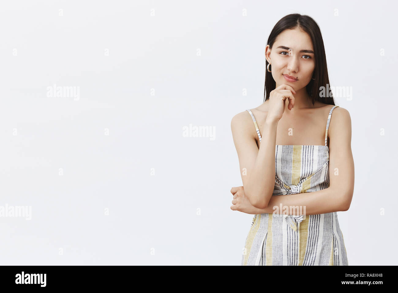 Person thinking smiling smirk hi-res stock photography and images - Alamy