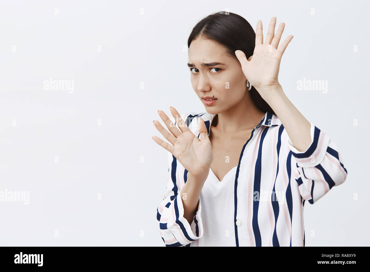 Timid woman hi-res stock photography and images - Alamy