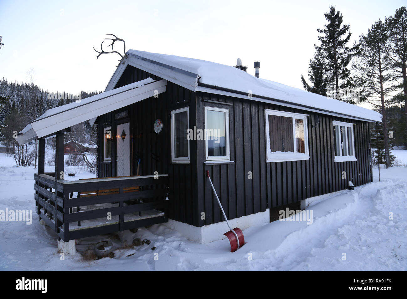 Traditional Norwegian cabin in the snow Stock Photo - Alamy
