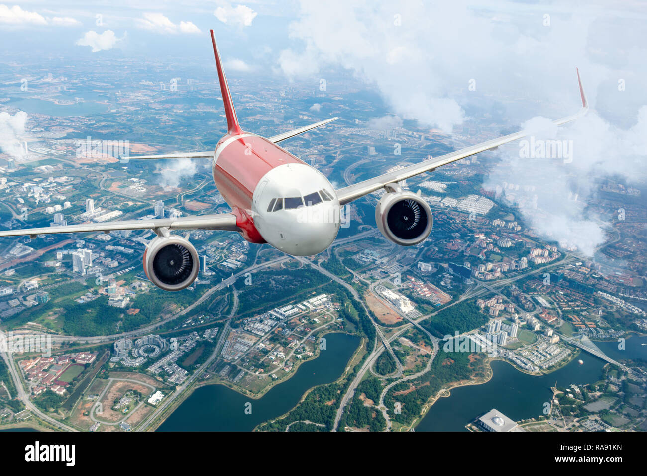 Airplane Flying Over City