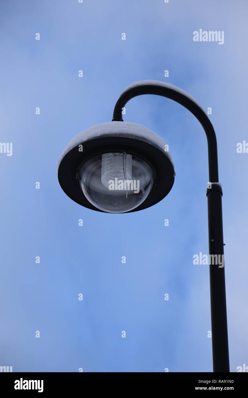 Norwegian street lamp with icicle Stock Photo - Alamy