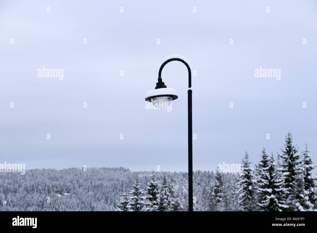 Norwegian street lamp with icicle Stock Photo - Alamy
