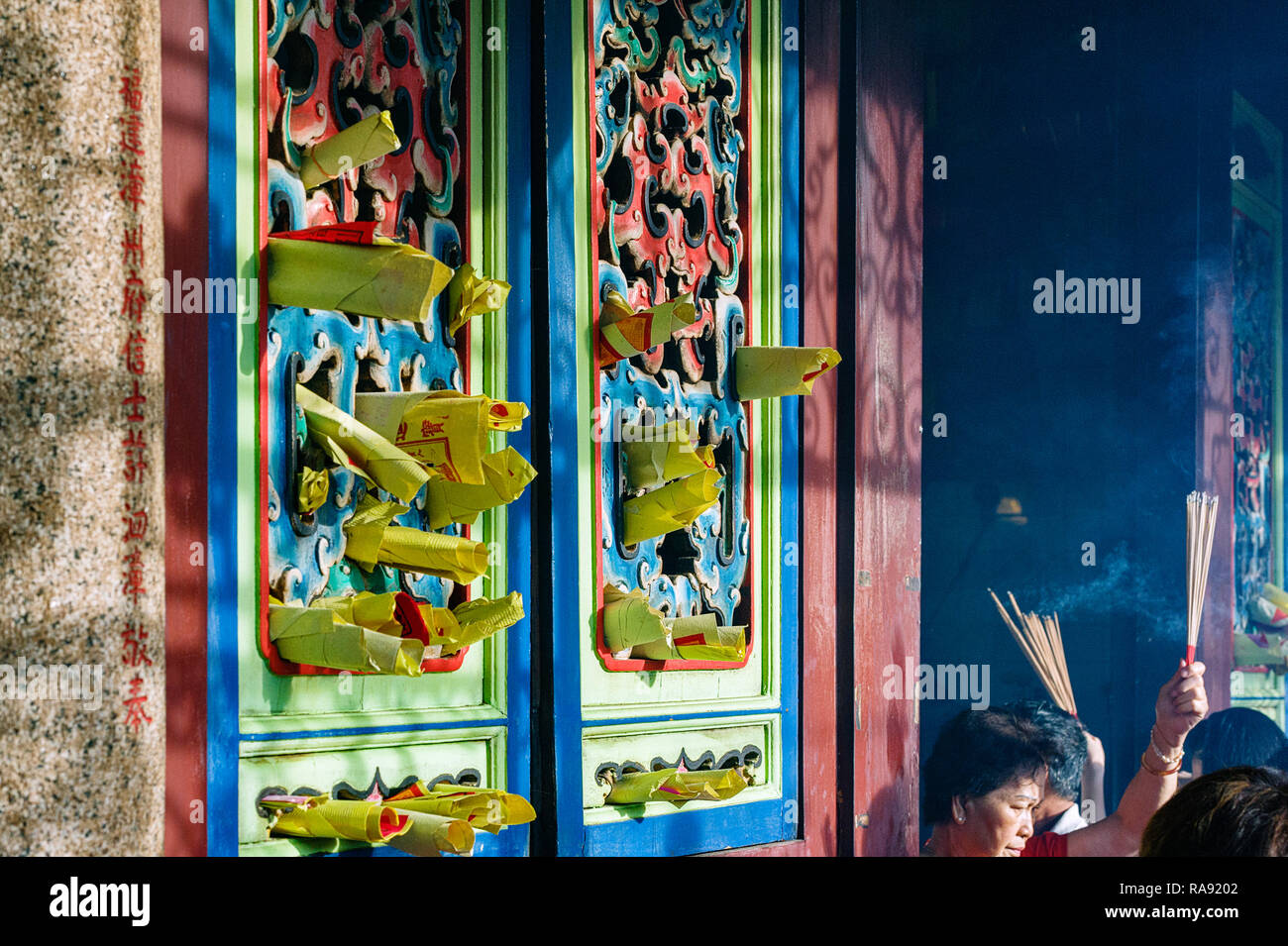 offerings of votive papers and pray inside of the Goddess of Mercy ...