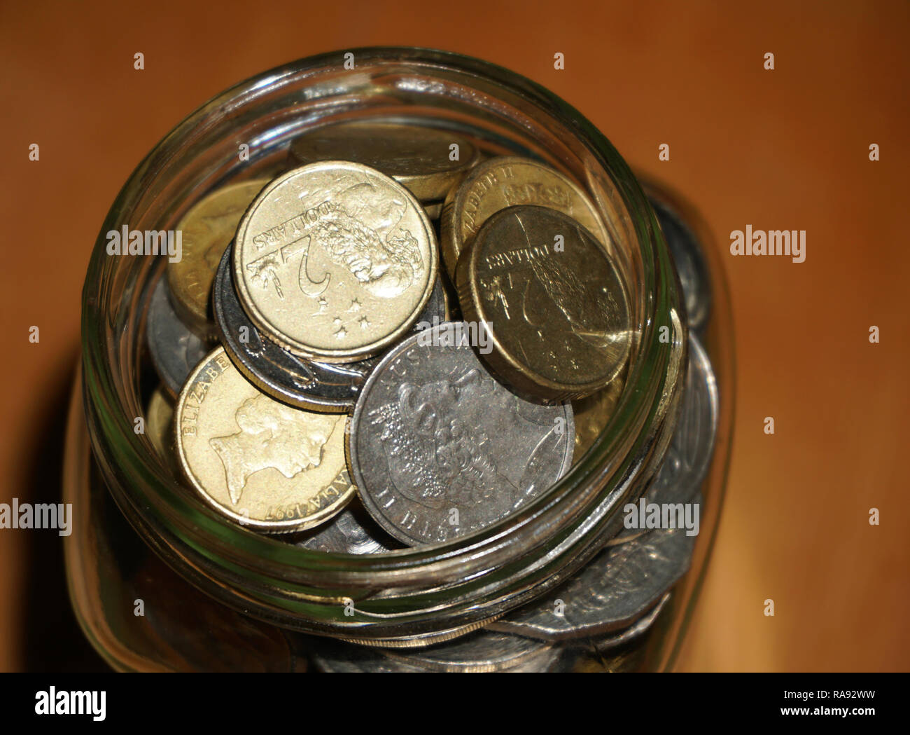 Money jar filling up hi-res stock photography and images - Alamy