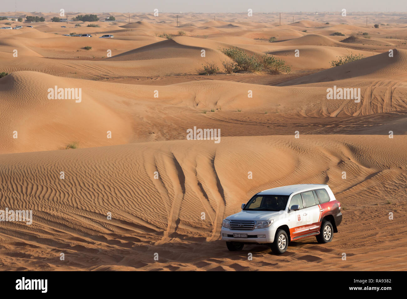 A Jeep safari in the desert dunes on the outskirts of Dubai in the ...