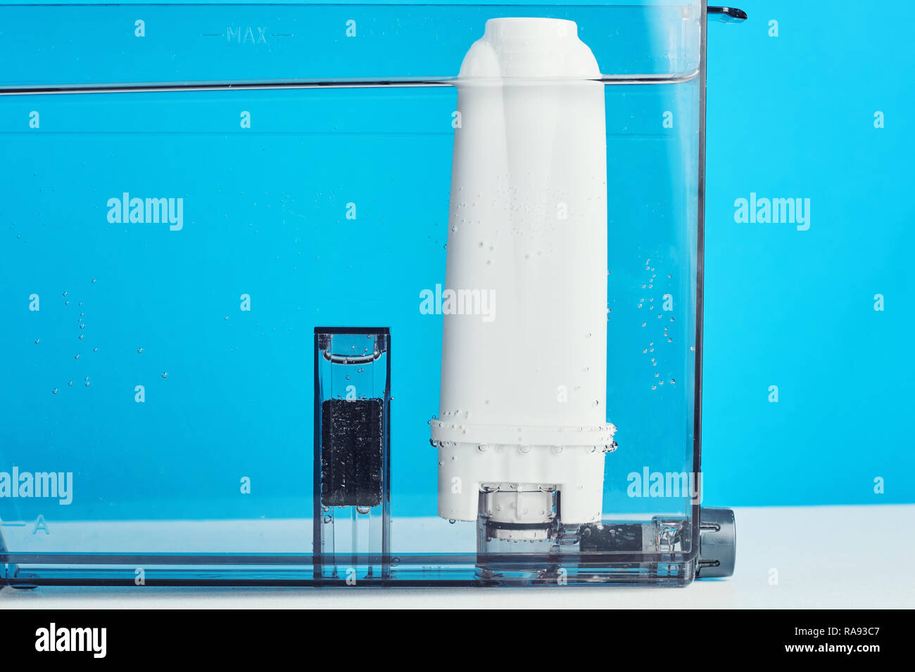 Filter water purification in coffee machine container. Kitchen ...