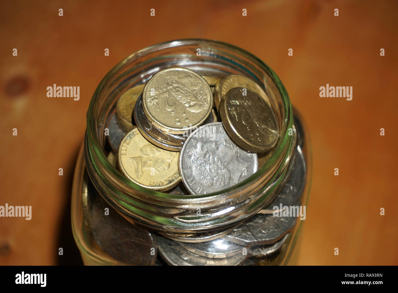 Money jar filling up hi-res stock photography and images - Alamy