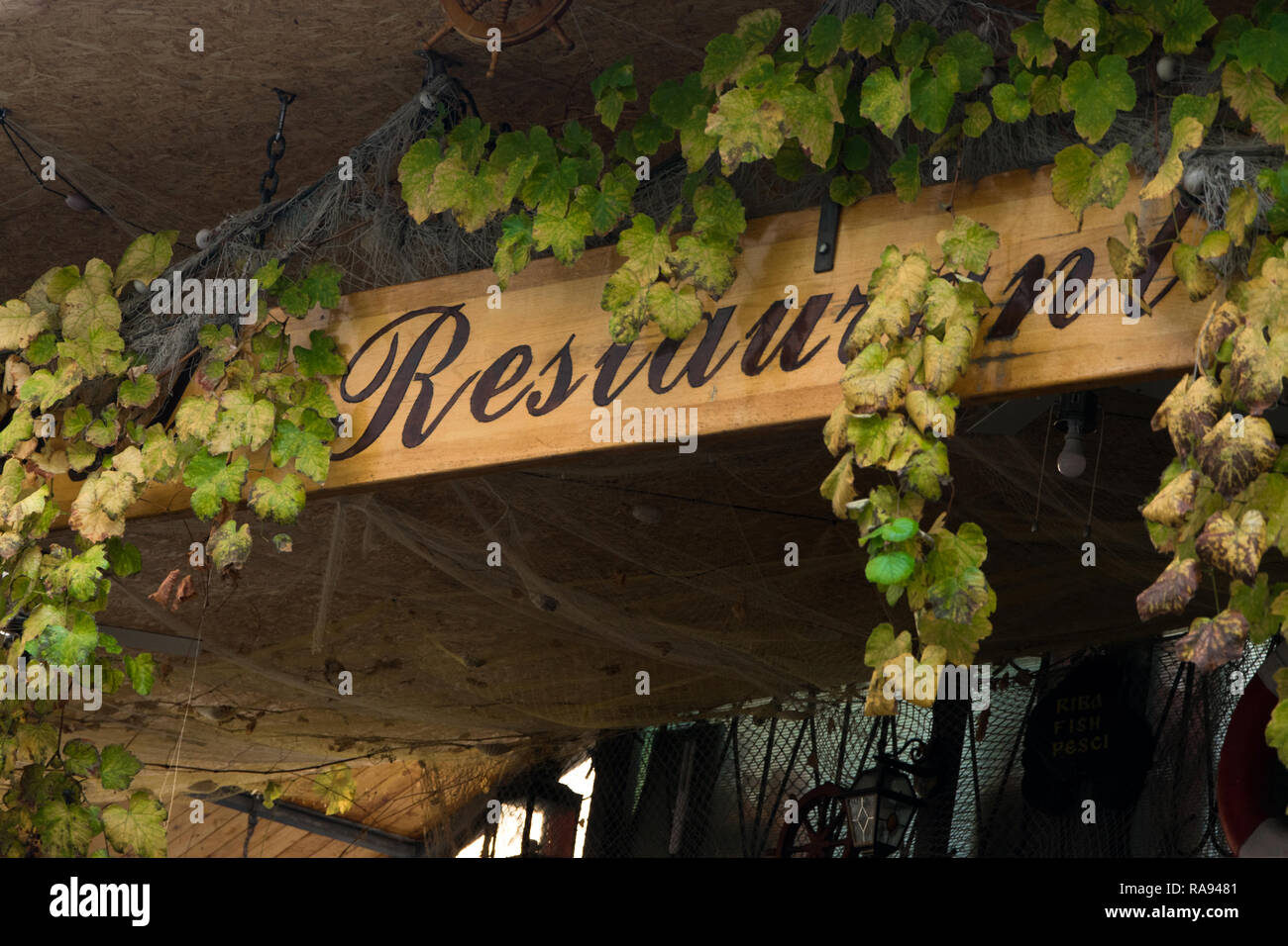 Crop view of a seafood restaurant sign Stock Photo - Alamy