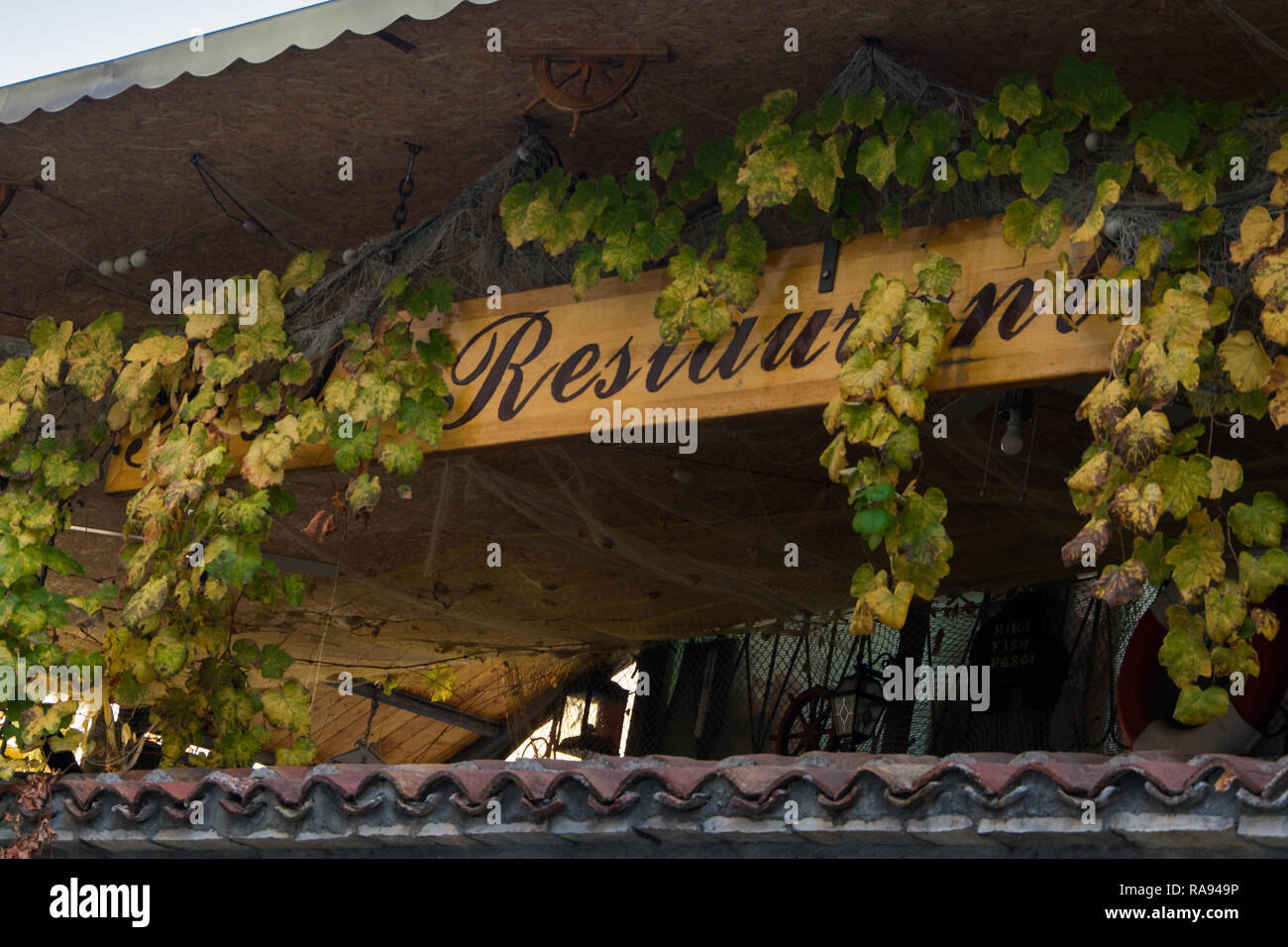 Crop view of a seafood restaurant sign Stock Photo - Alamy