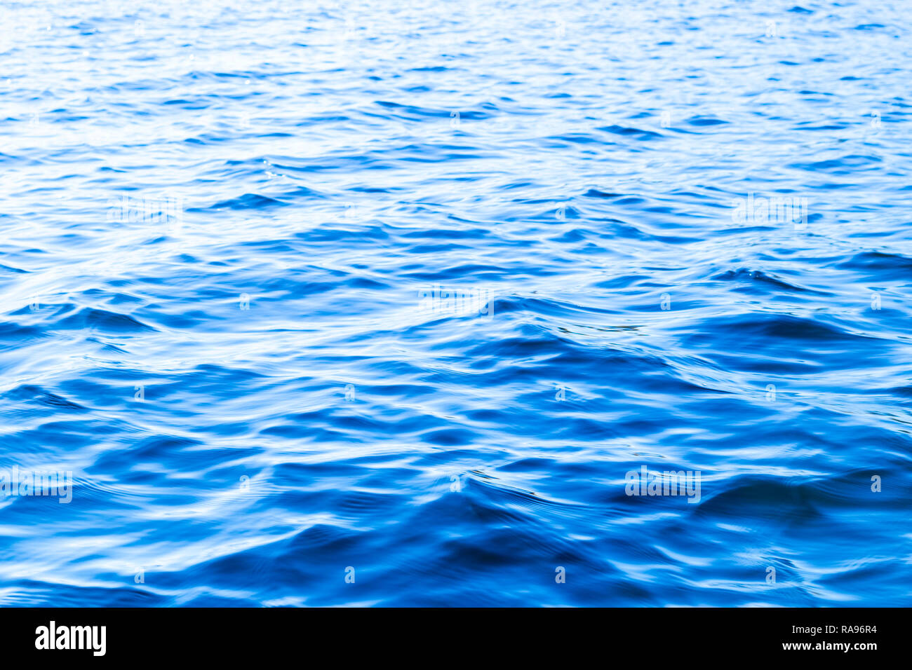 View of a Crystal clear sea water texture. View from above Natural blue ...