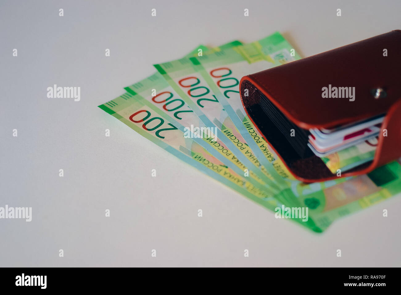 brown leather wallet with plastic cards and Bank of Russia banknotes ...
