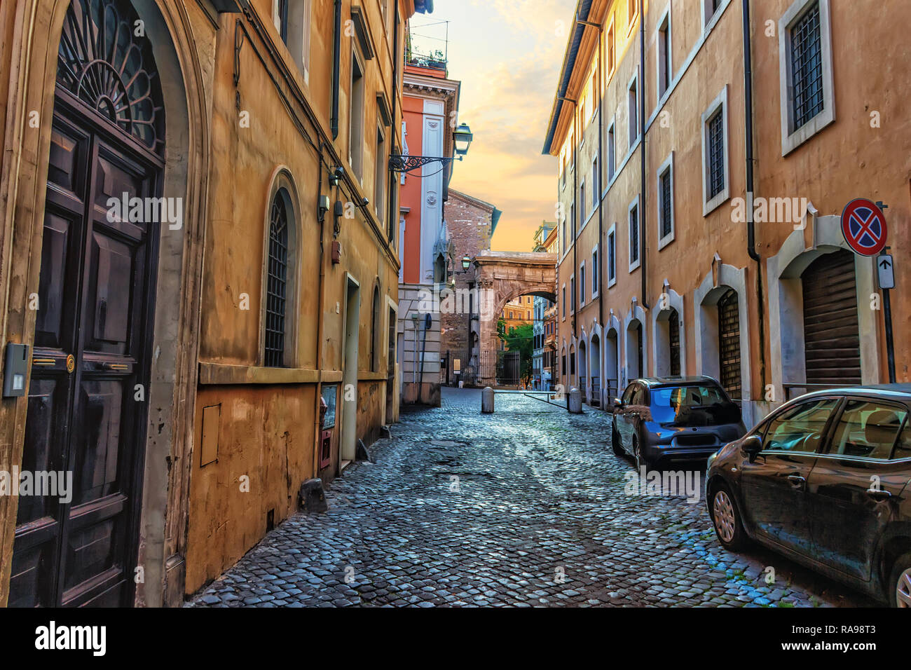Traditional Rome street in the centre, stone pavement and ancien Stock ...