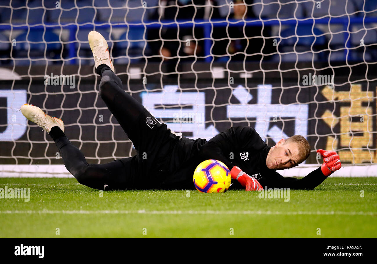 Burnley goalkeeper Joe Hart warms up before the Premier League match at ...