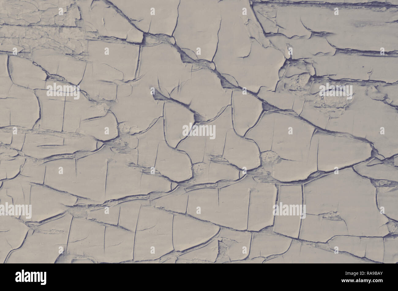 Cracked gray paint close-up on the surface Stock Photo - Alamy