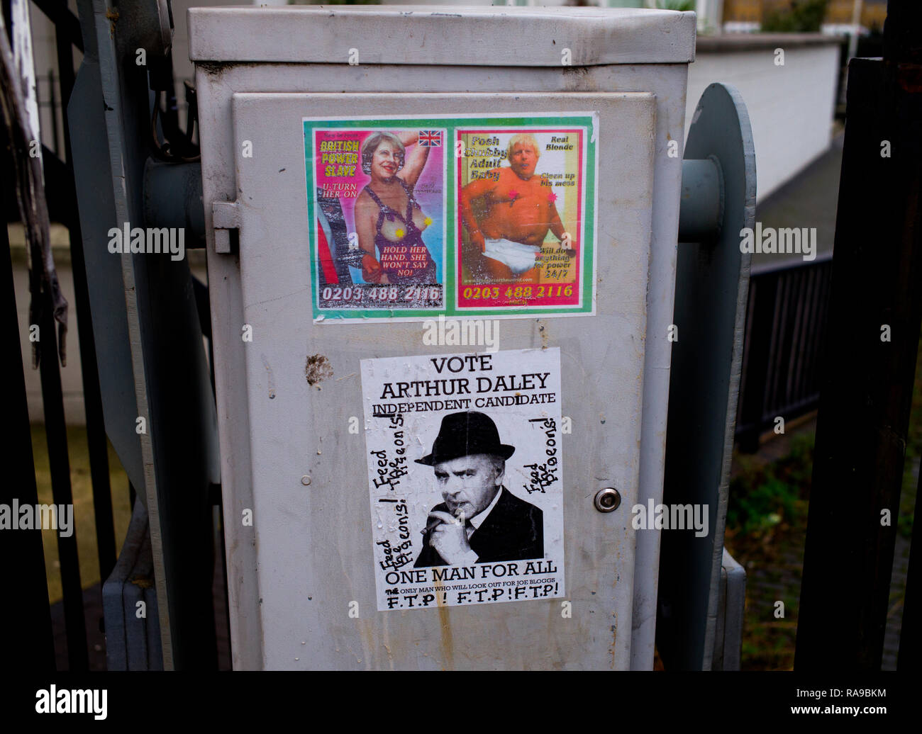 Anti-Establishment posters in Limehouse East London. Anti PM May ...