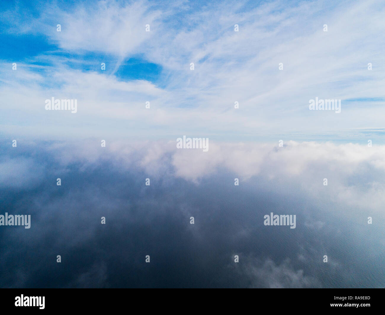 Aerial view White clouds in blue sky. Top view. View from drone. Aerial bird's eye view. Aerial ...