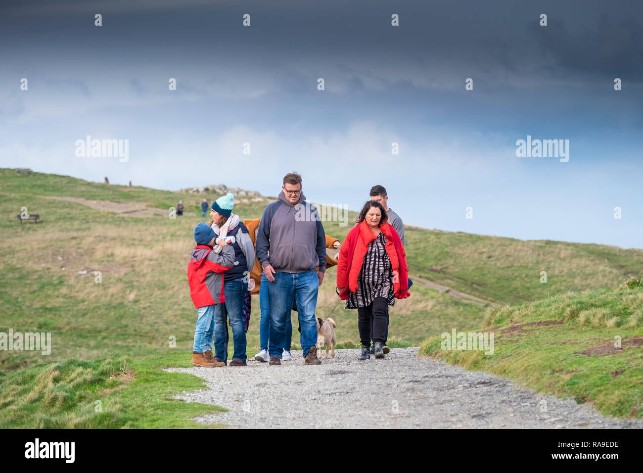 A family enjoying a walk along a path Stock Photo - Alamy