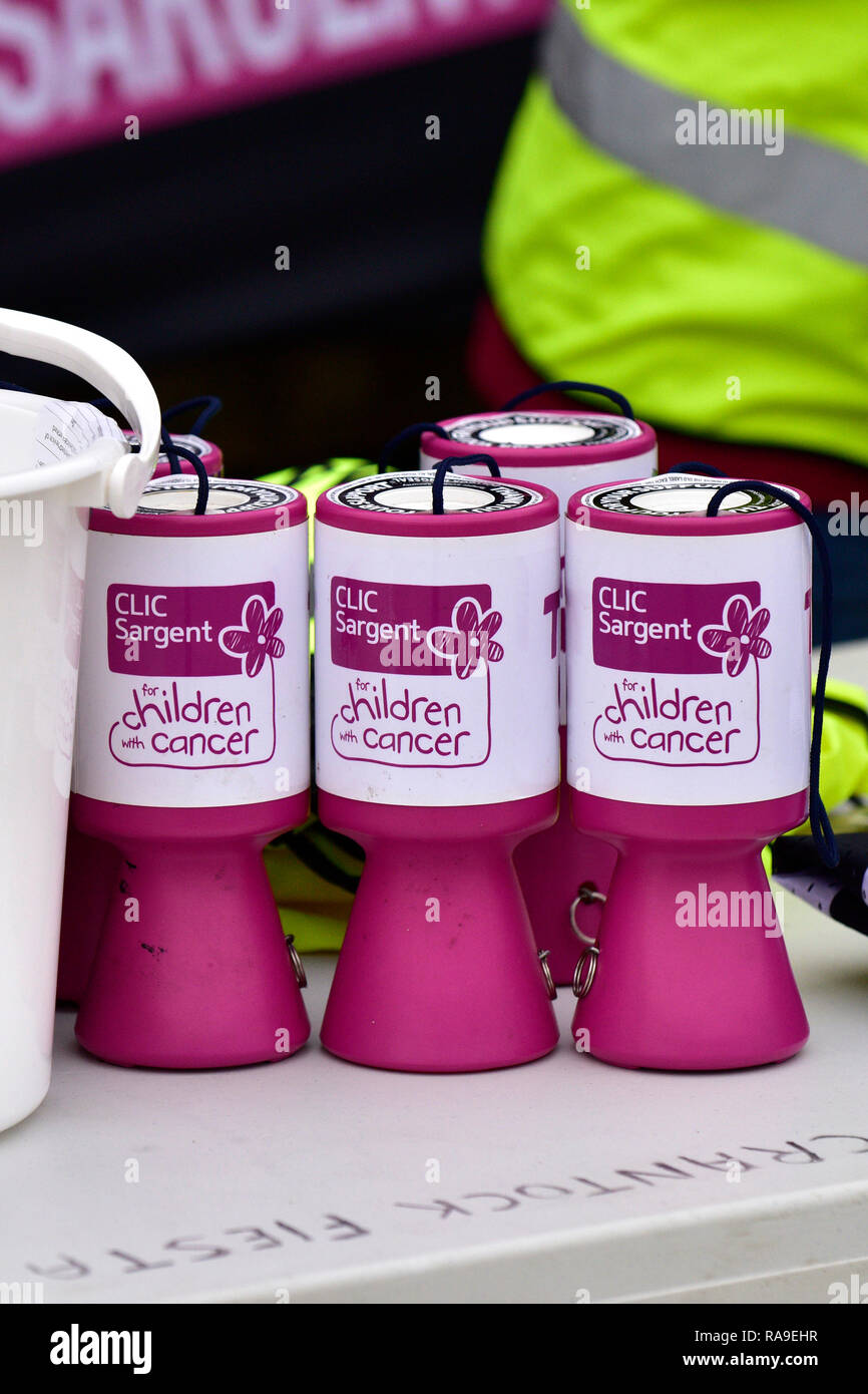 Collecting boxes tins for theb CLIC Sargent charity supporting children ...