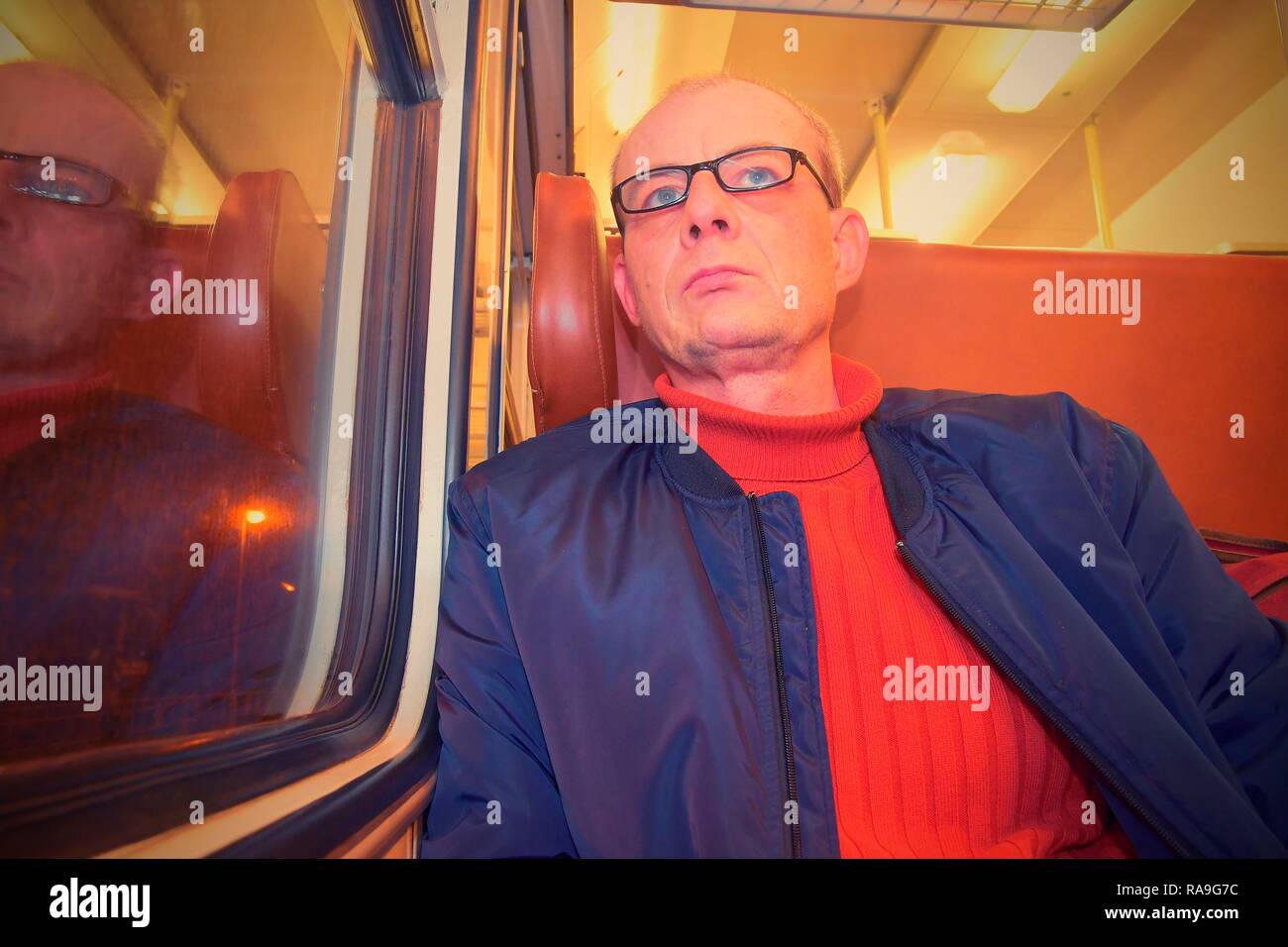Elderly looking out train window hi-res stock photography and images ...