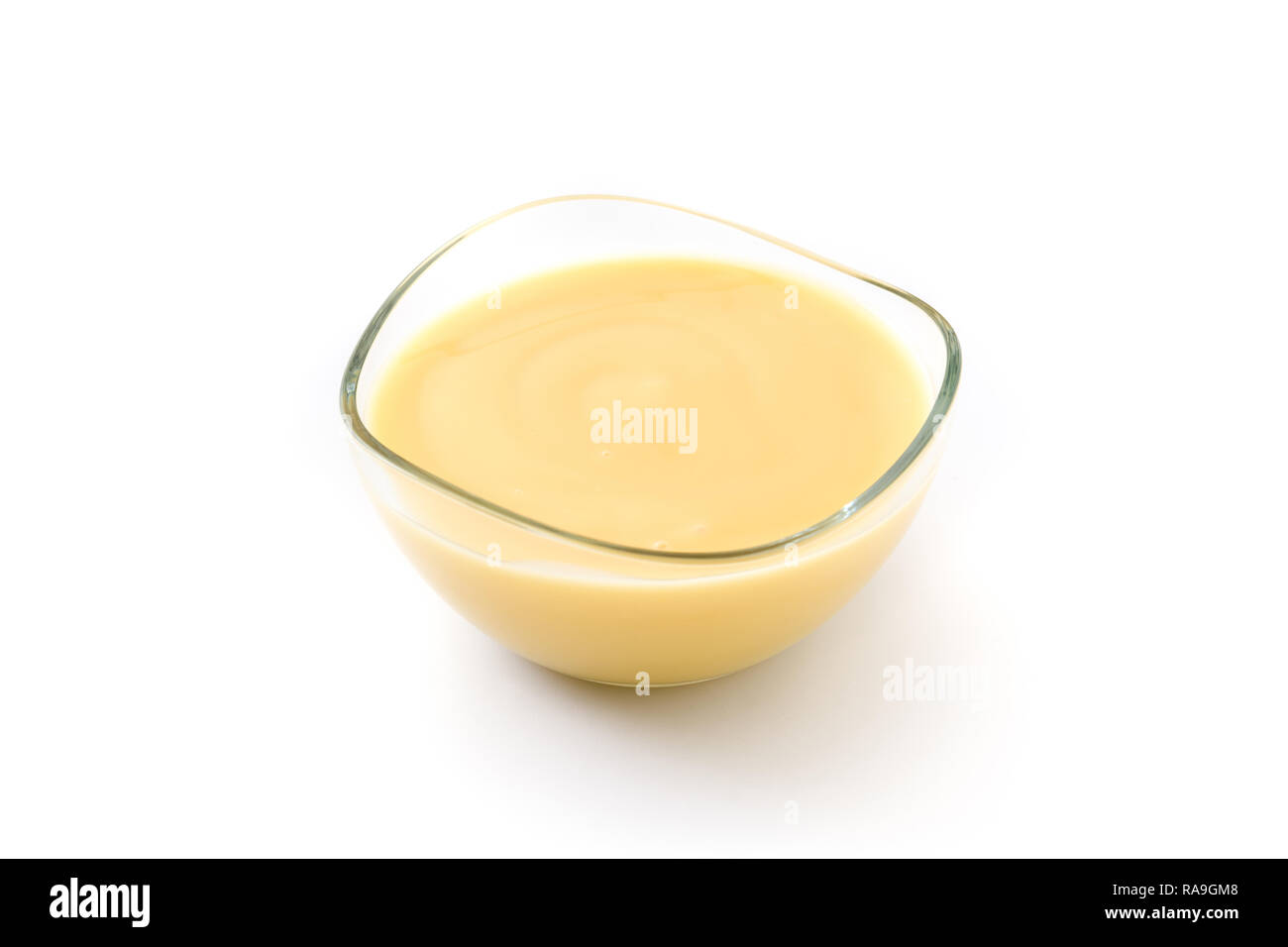Bowl of homemade vanilla custard isolated on white background Stock ...