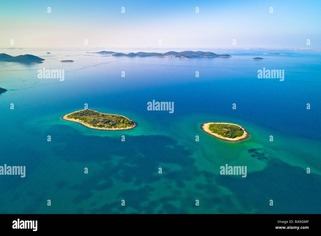 Two lonely stone islands in Zadar archipelago aerial view, Dalmatia ...