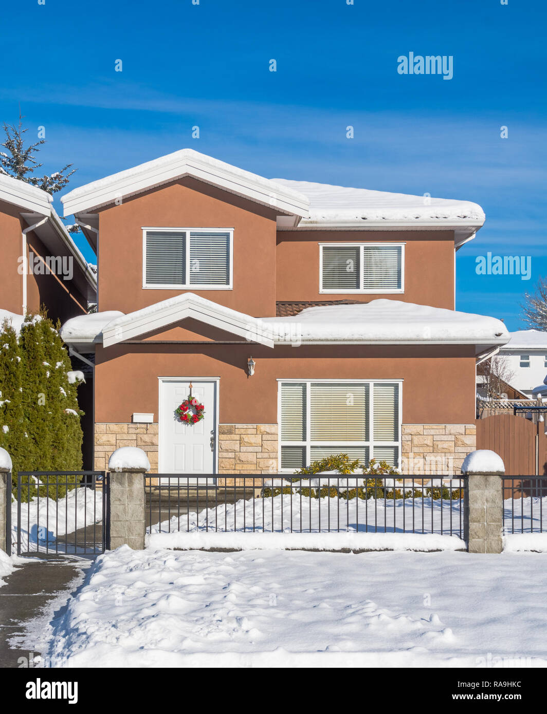 A typical american house in winter. Entrance average house decorated ...