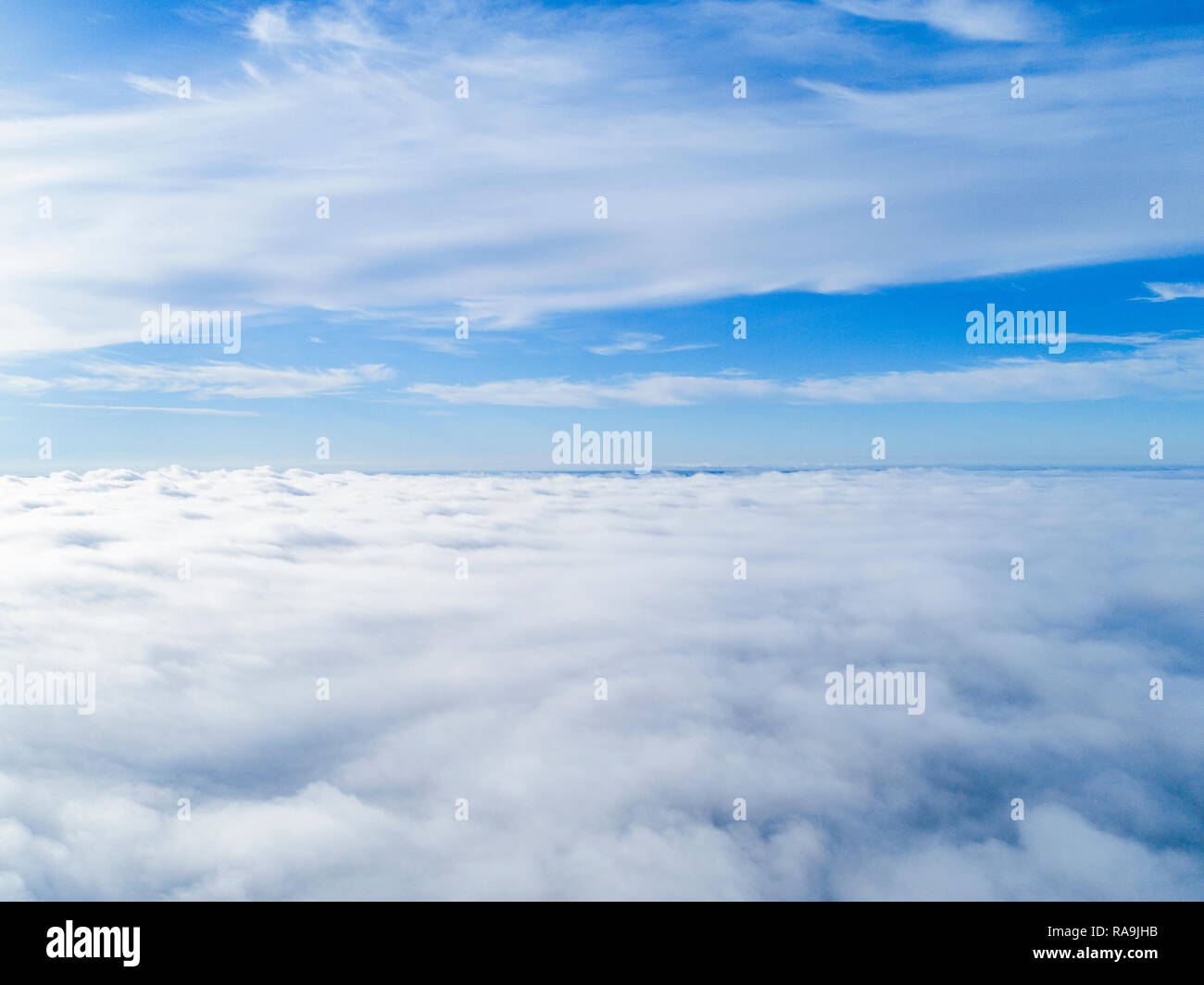 Aerial view White clouds in blue sky. Top view. View from drone. Aerial bird's eye view. Aerial ...