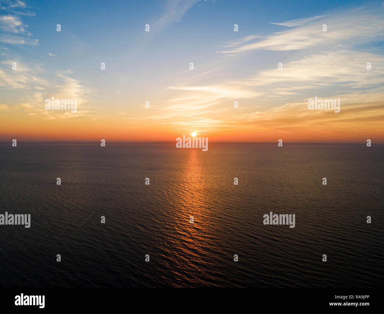 Aerial view of a Sunset sky background. Aerial Dramatic gold sunset sky ...