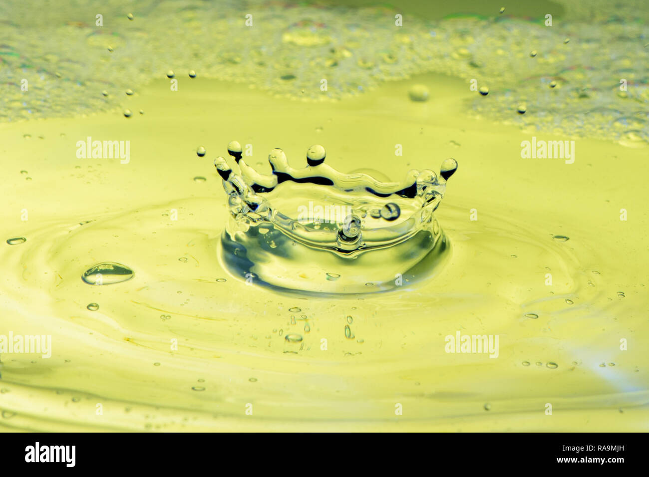 falling water drop forming a crown Stock Photo - Alamy