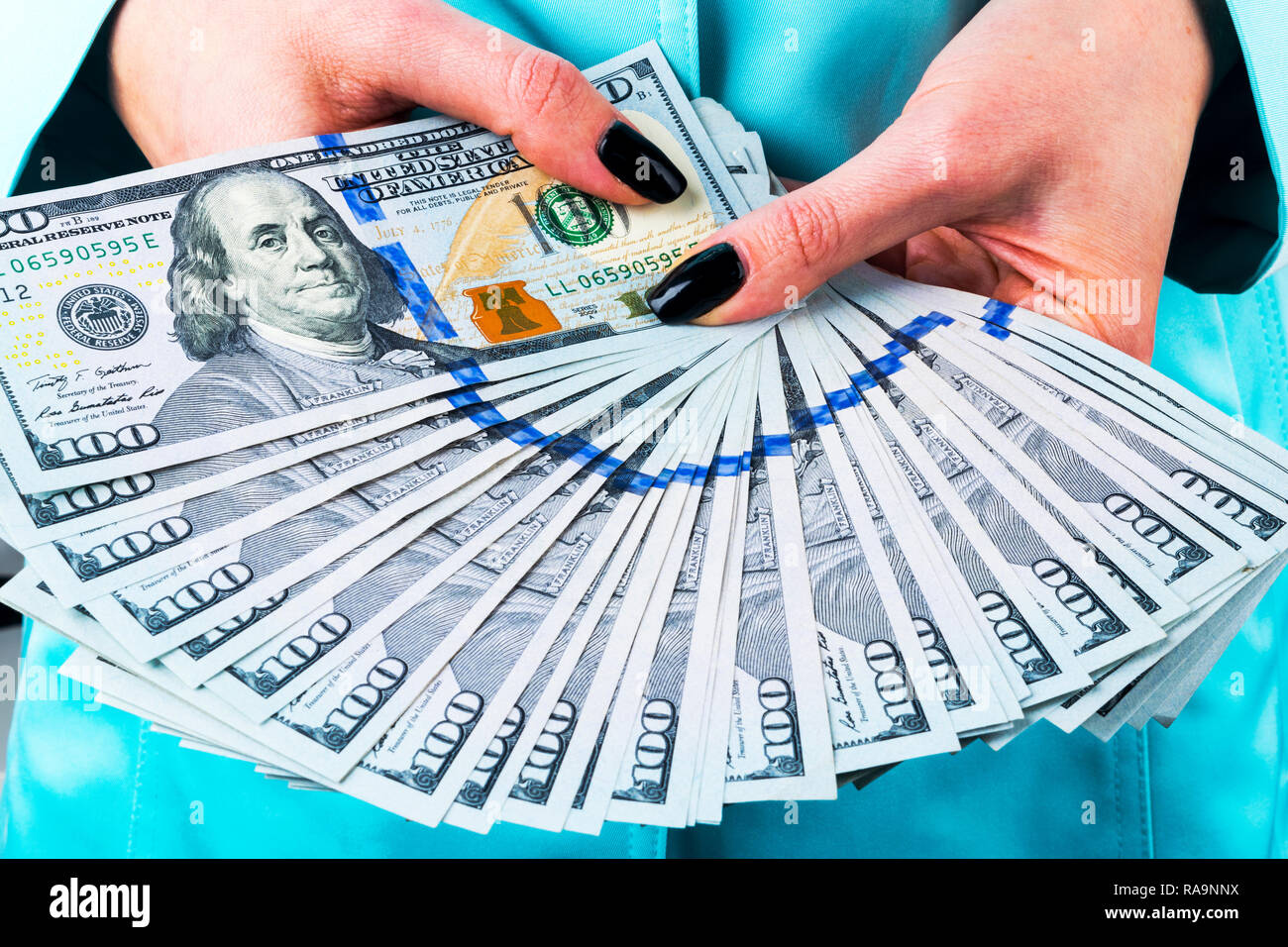 Business woman counting money in hands. Handful of money. Offering ...