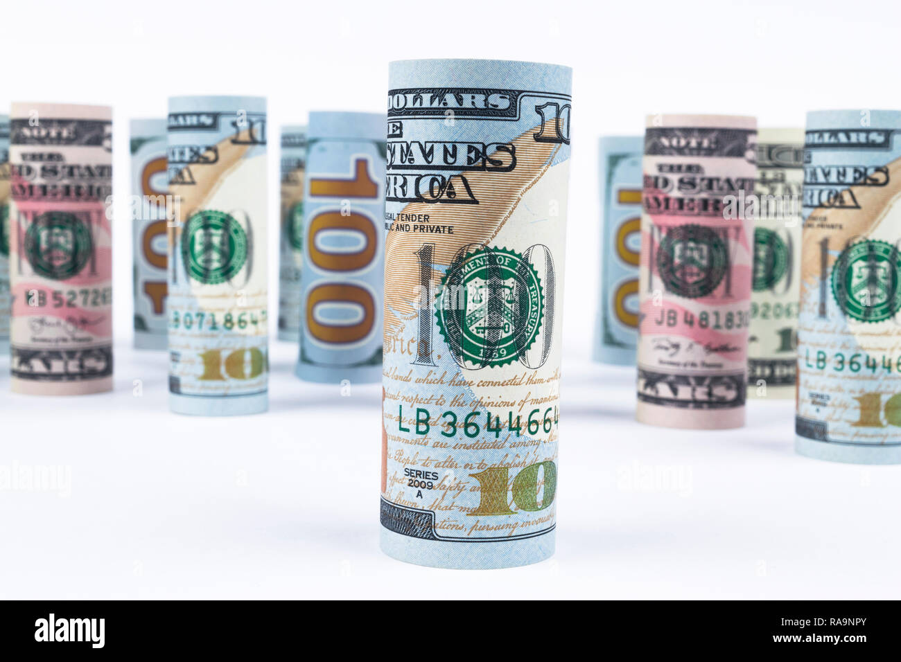 Dollar. Dollar banknotes roll in other positions. American US currency ...