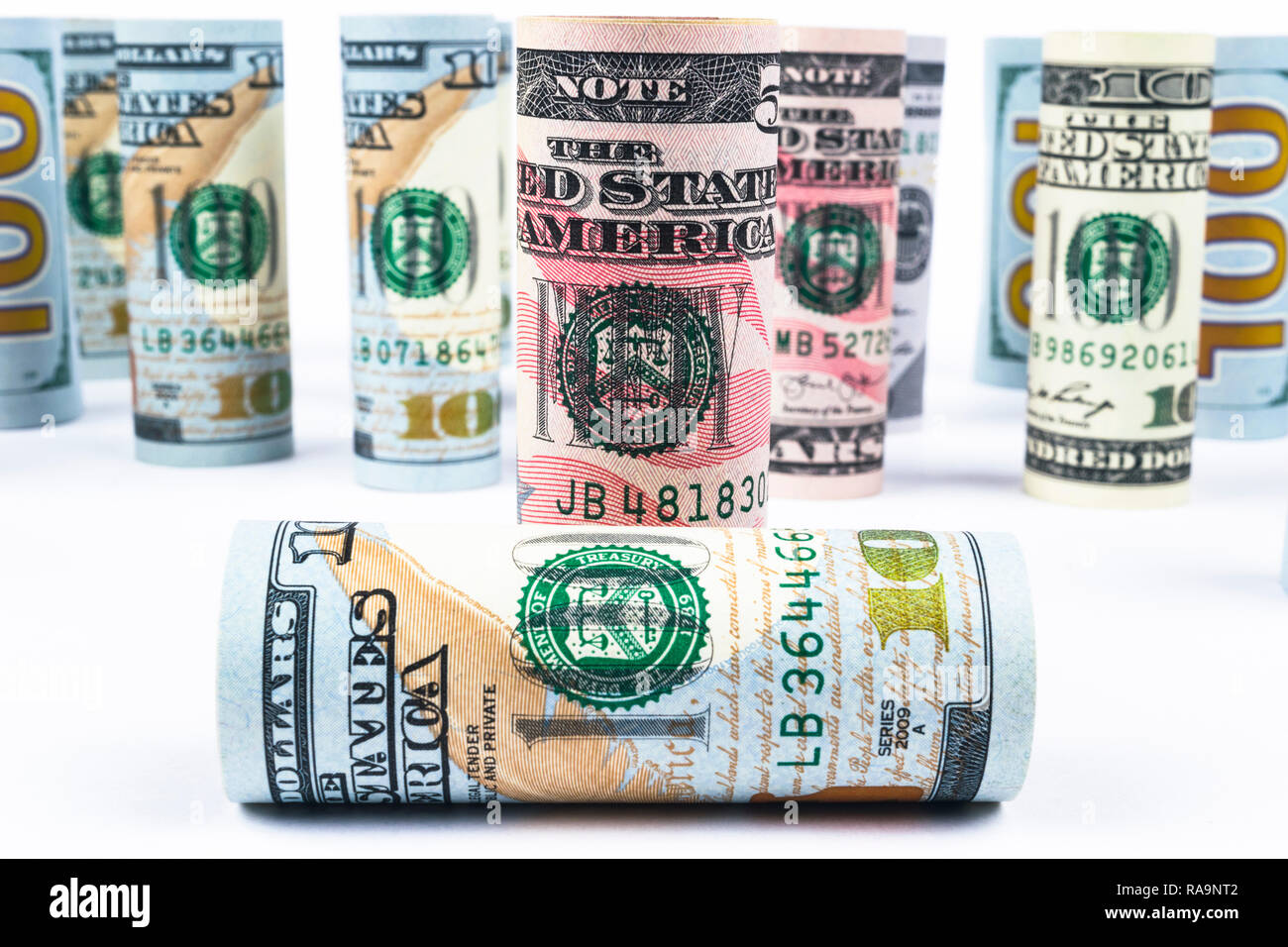 Dollar. Dollar banknotes roll in other positions. American US currency ...