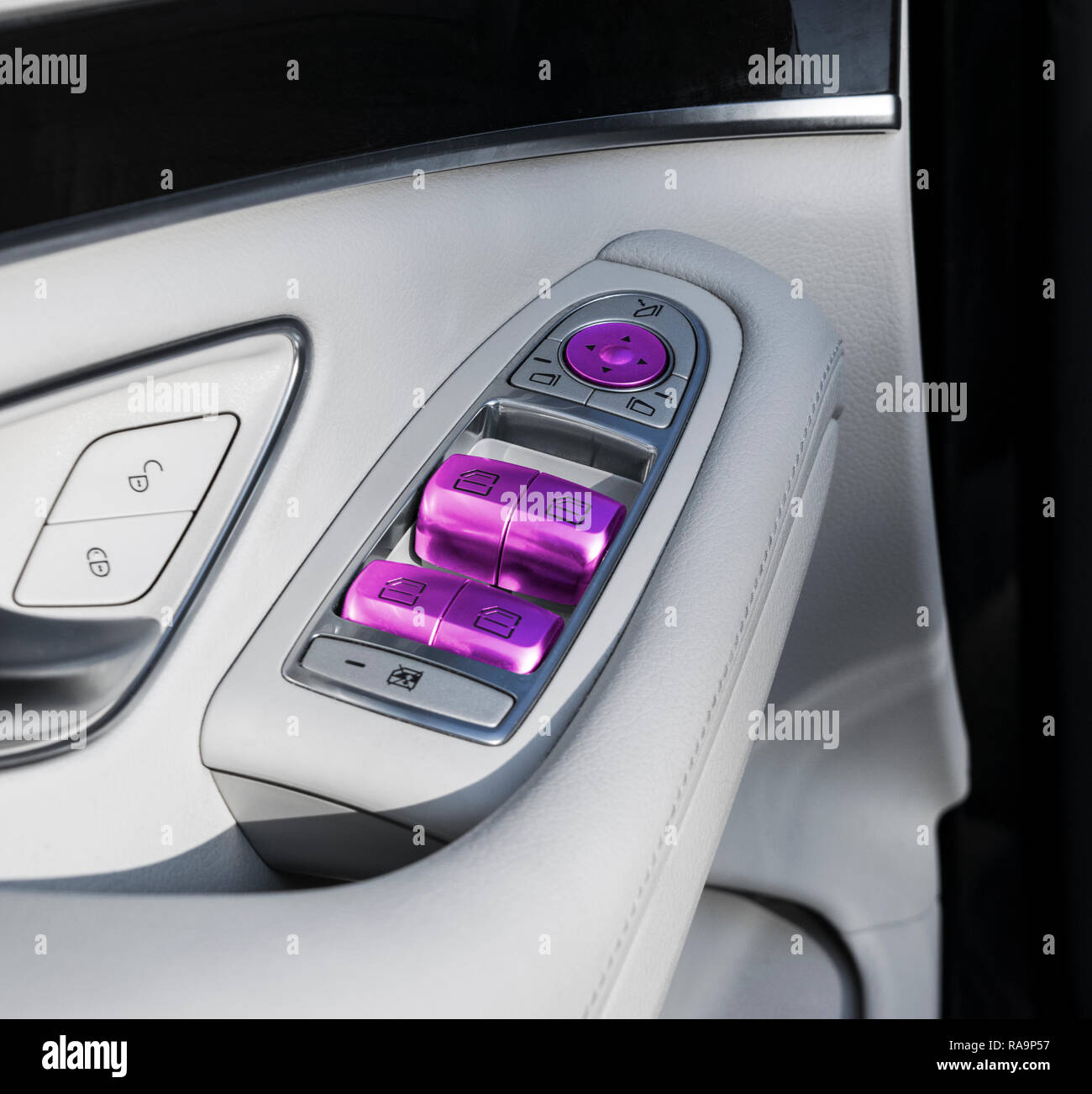 Car white leather interior details of door handle with windows controls ...