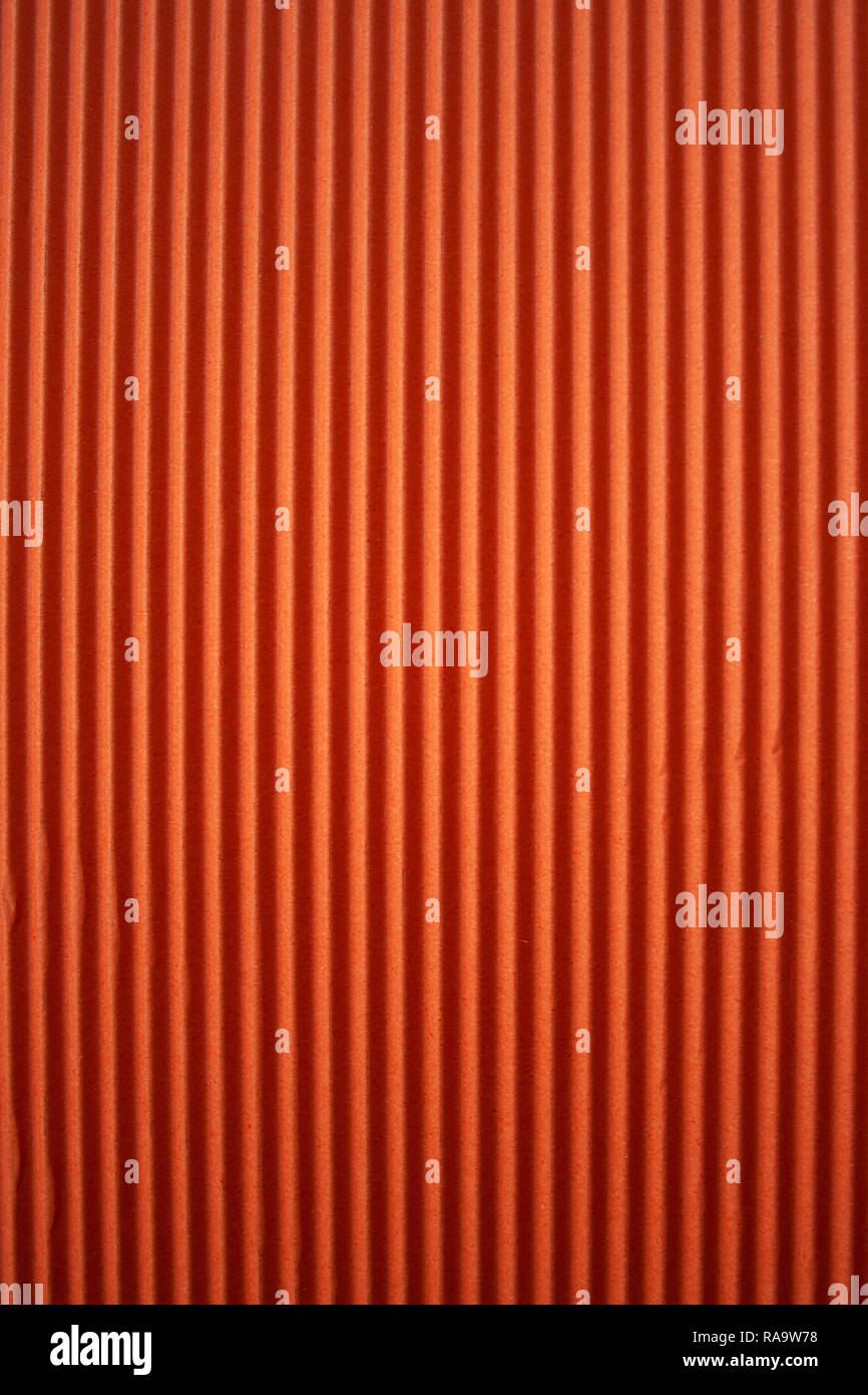 Red corrugated paper texture. Abstract red background Stock Photo - Alamy